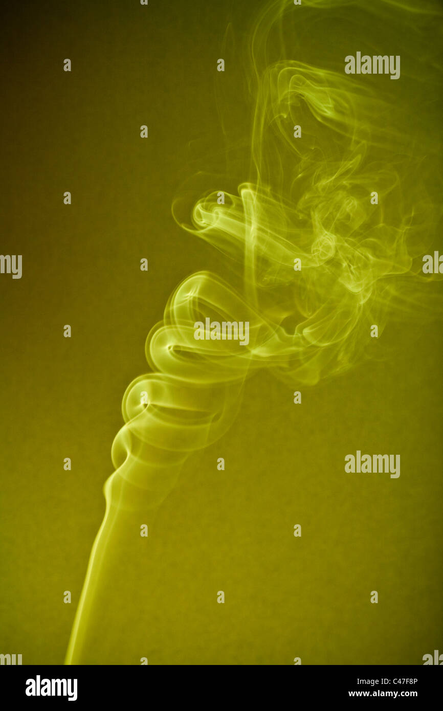 Spiral smoke pattern from a burning incense stick Stock Photo - Alamy