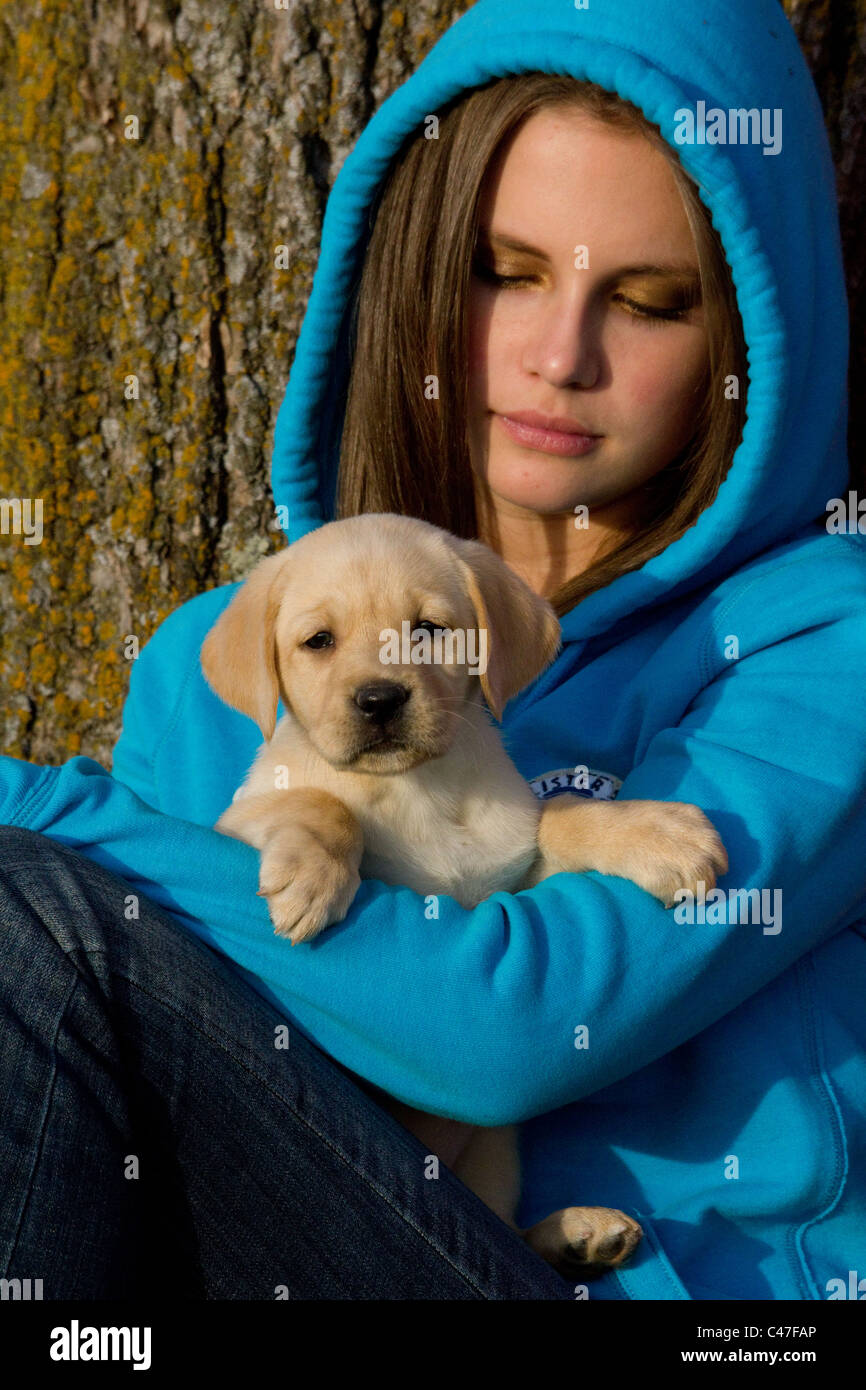 Young woman and Labrador retriever Stock Photo - Alamy
