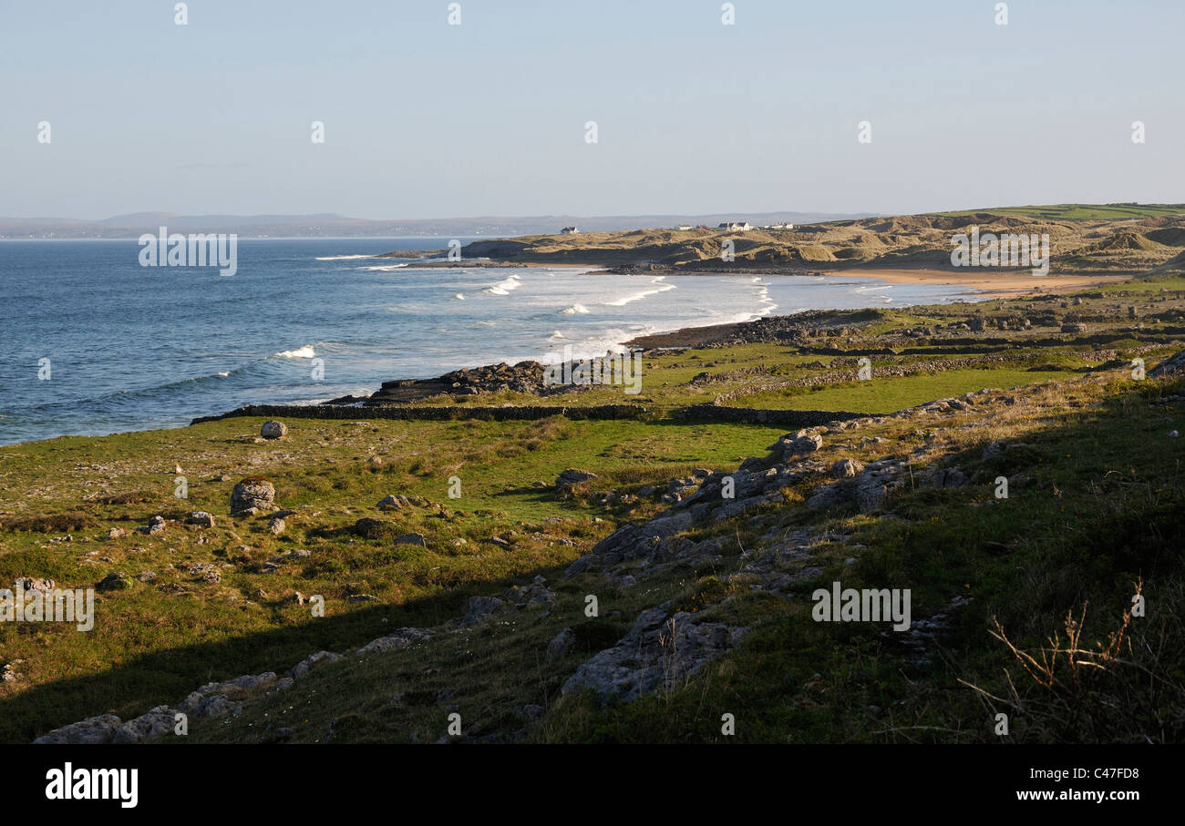 Surf on Fanore beach & sand dunes Stock Photo - Alamy