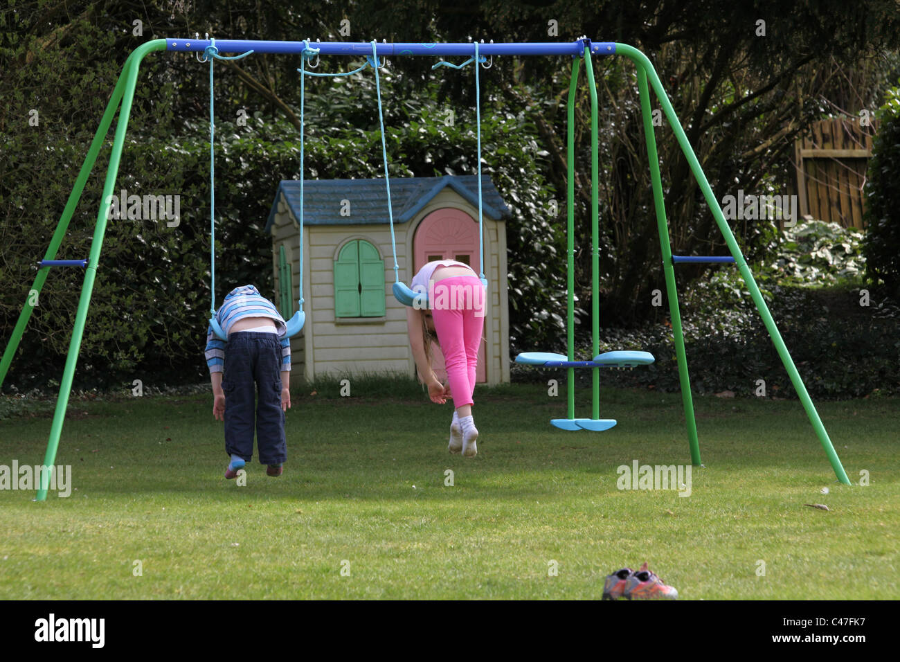 Children on swings Stock Photo - Alamy