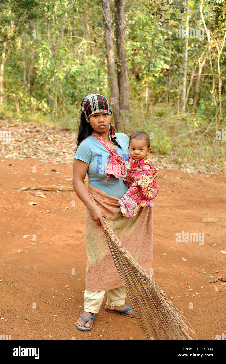 Happy dad carries serious podgy cute son Stock Photo - Alamy