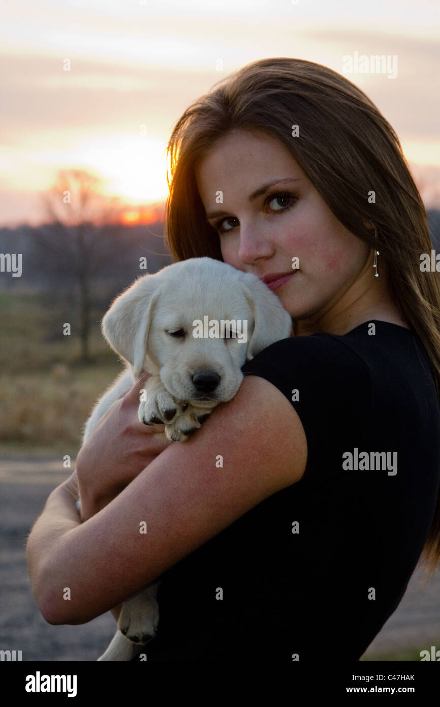 Young woman and Labrador retriever Stock Photo - Alamy