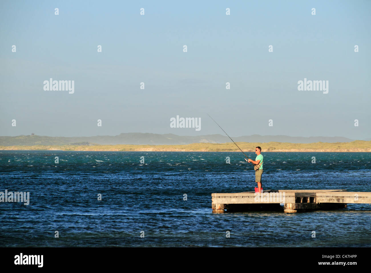 Fisherman on a wooden pier, Peel Inlet, Augusta Southwest Australia ...