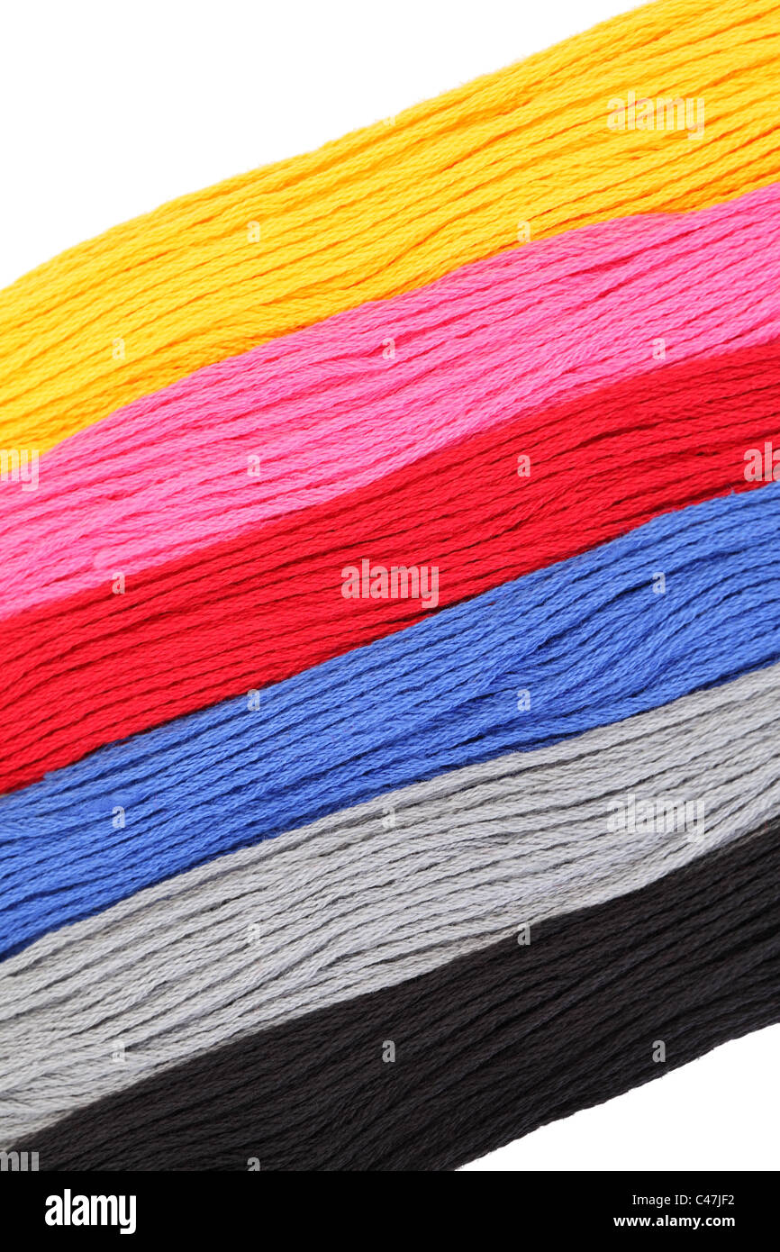 Colorful thread isolated on white background Stock Photo - Alamy