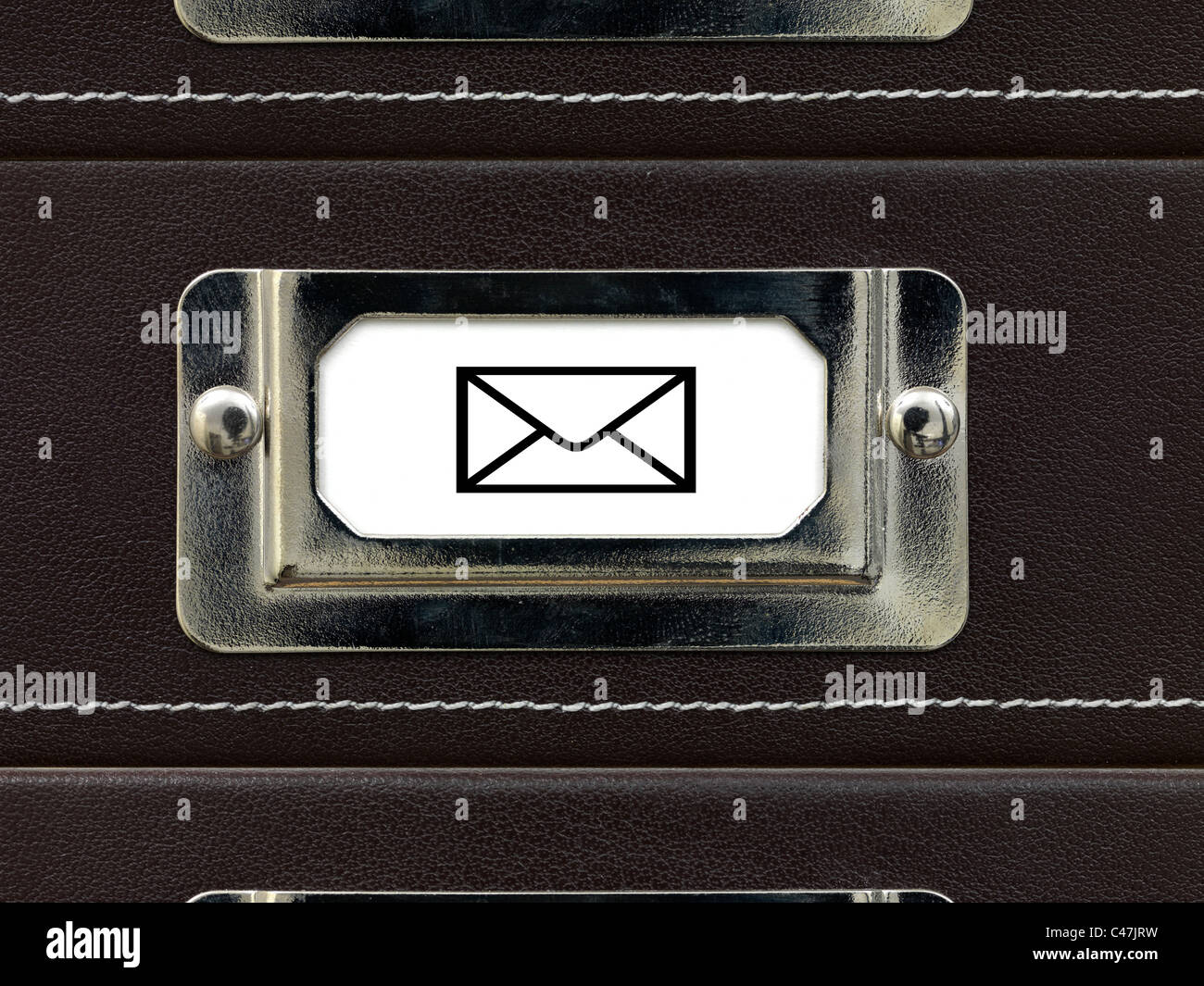An office tray label on a leather tray Stock Photo - Alamy