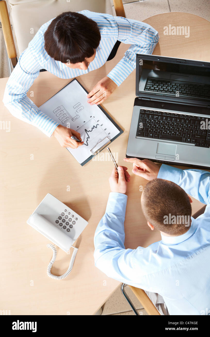 Photo of smart businessman and secretary interacting in office Stock ...