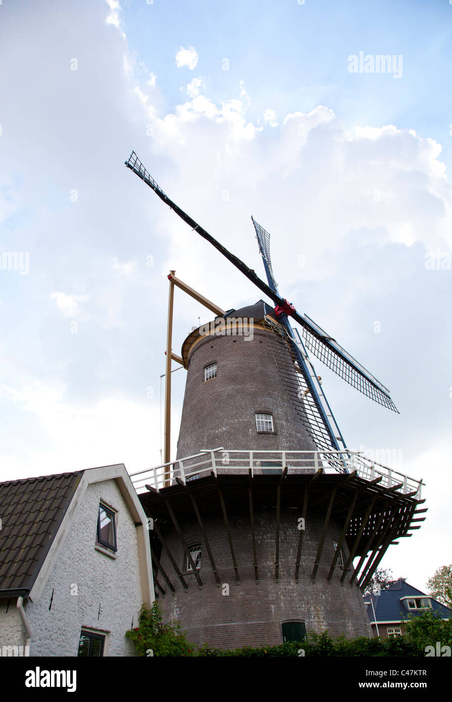 Dutch mill with blue sky Stock Photo - Alamy
