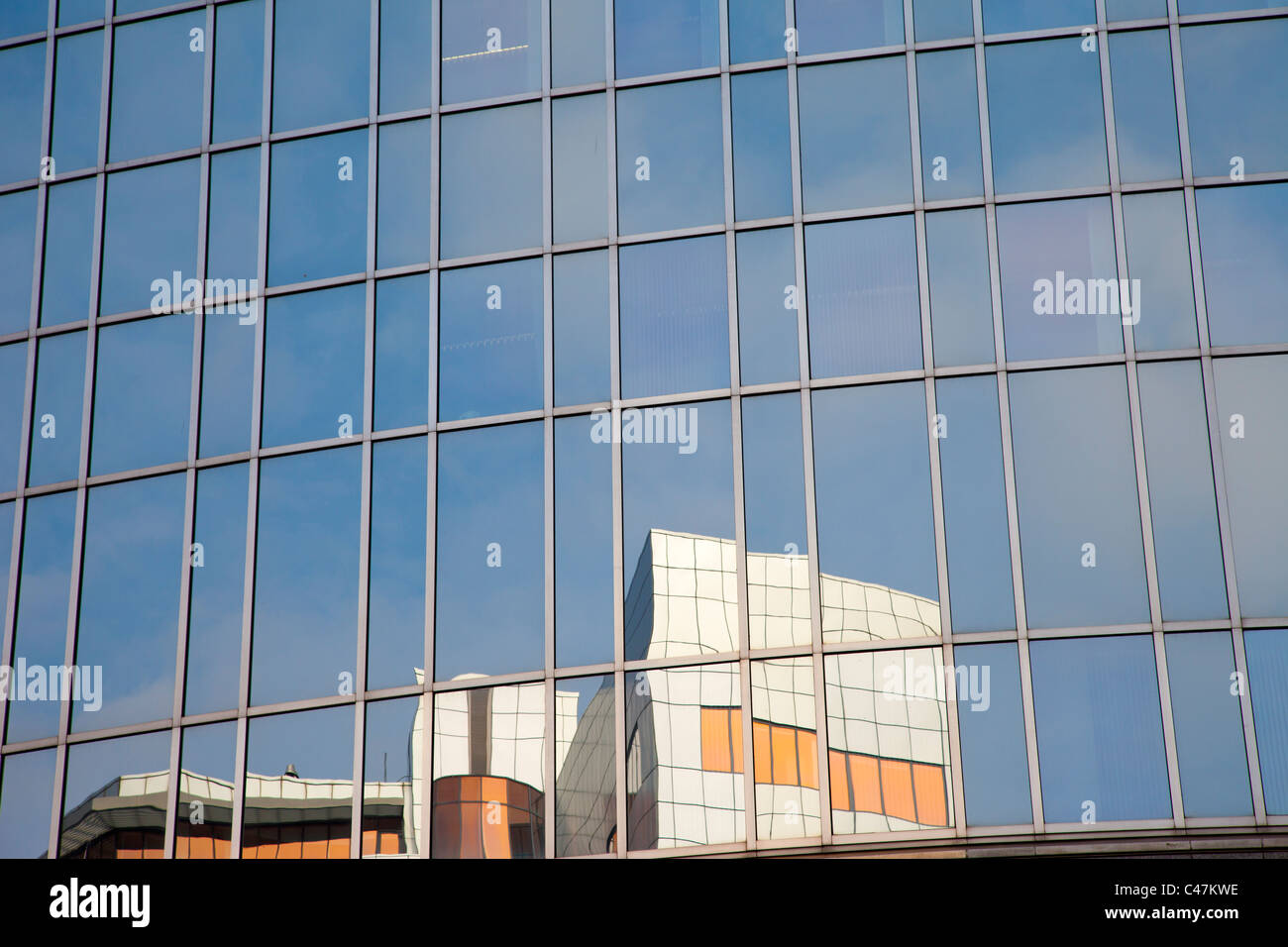 Modern office building with colorful windows Stock Photo - Alamy