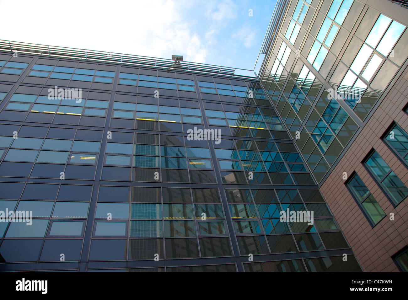 Modern office building with colorful windows Stock Photo - Alamy