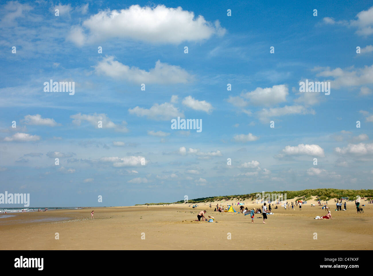 People enjoying sunny weather on Holkham Beach, North Norfolk, UK Stock ...