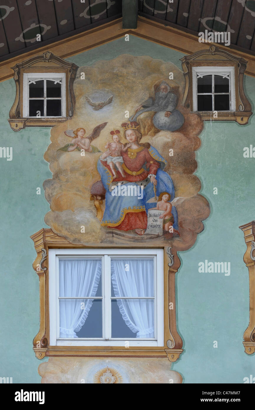 house facade and window decorated with traditional painting in Bavaria ...