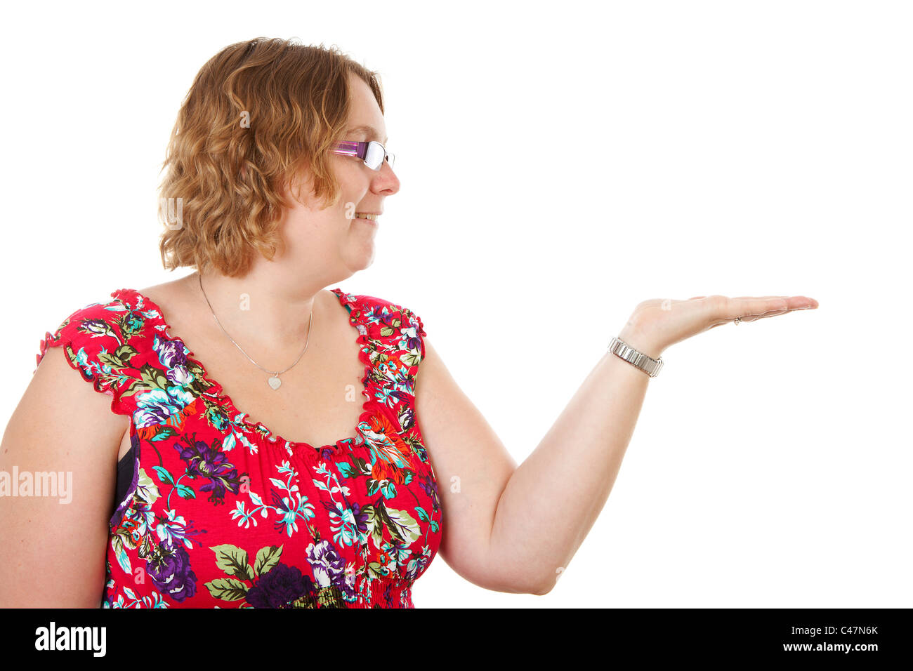 woman with open hand and pointing over white background Stock Photo - Alamy