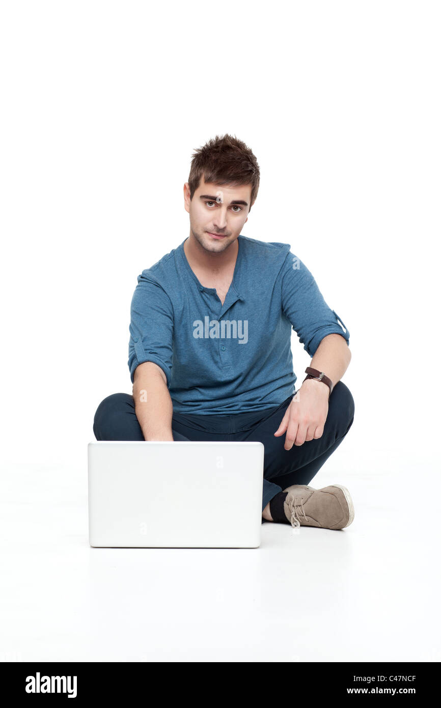 handsome man sitting with laptop looking camera Stock Photo - Alamy