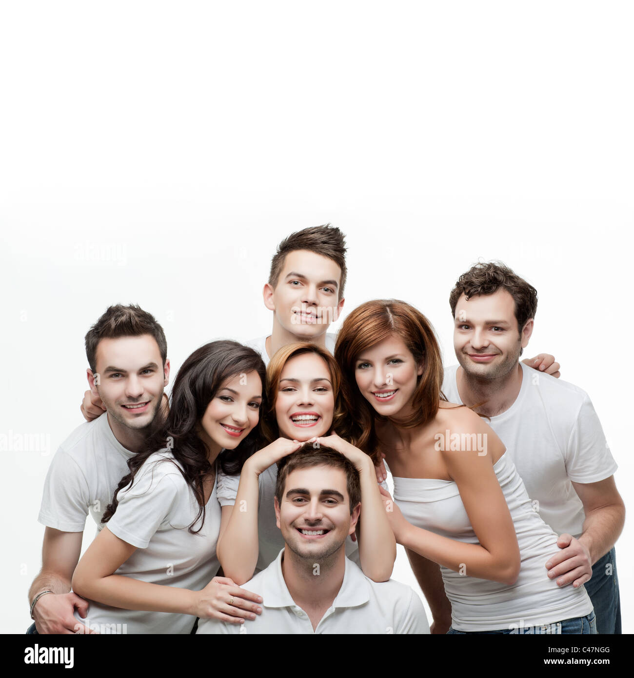 group young friends sitting down having fun Stock Photo - Alamy