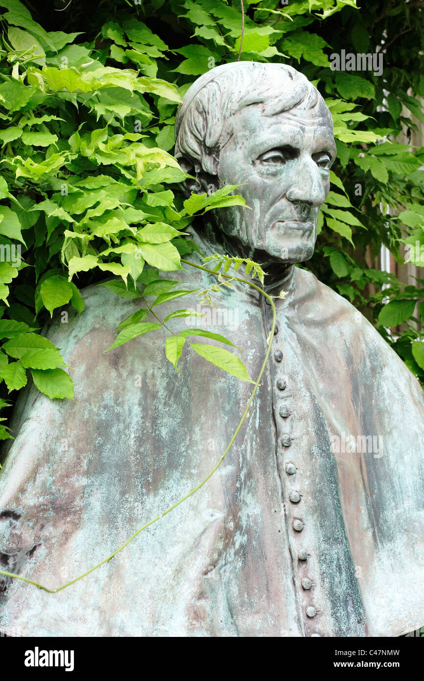 A bronze statue of Cardinal John Henry Newman in the grounds of Trinity ...