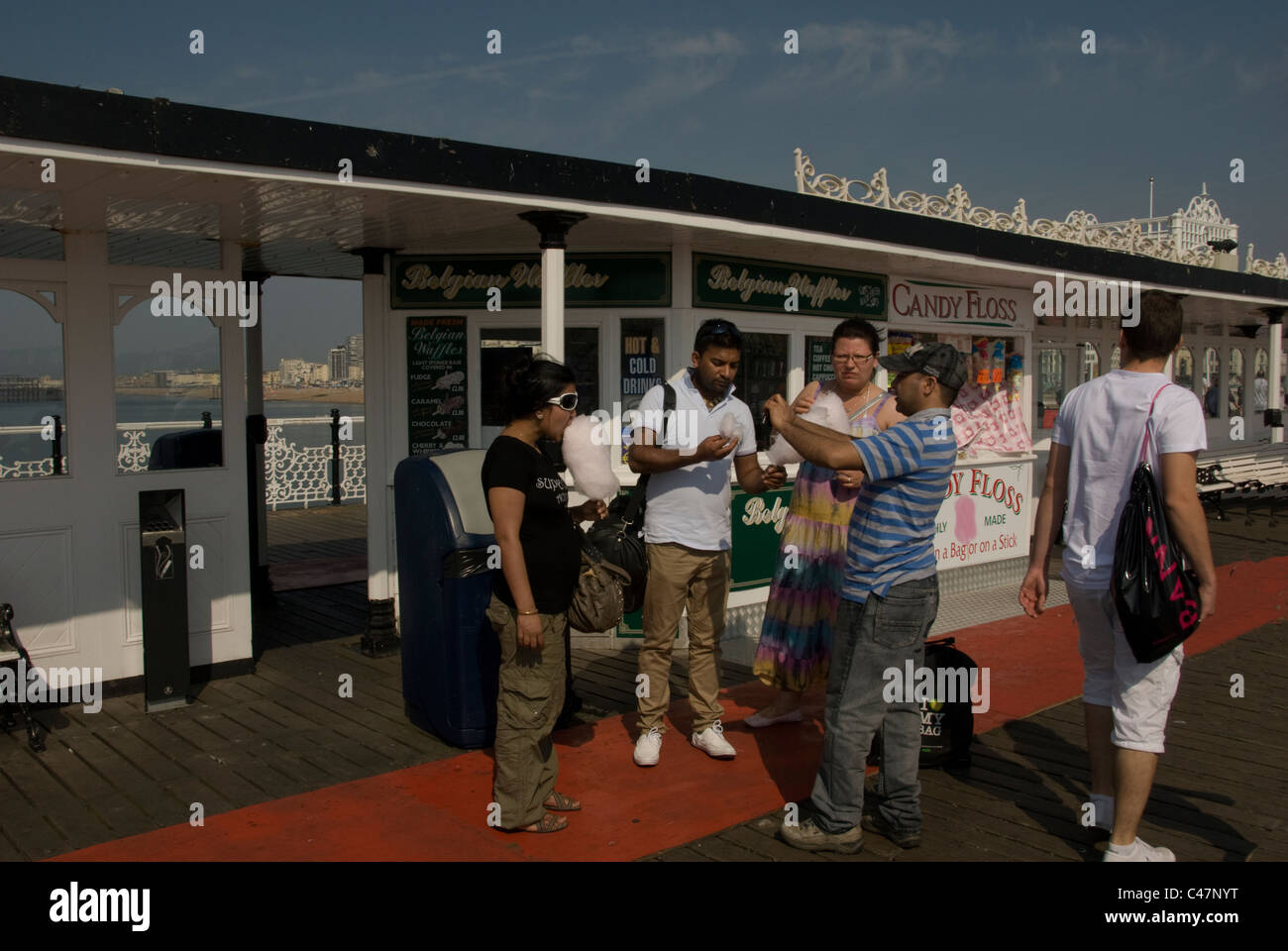 EAST SUSSEX; BRIGHTON; THE PIER; RECORDING THE CANDY FLOSS EXPERIENCE ...