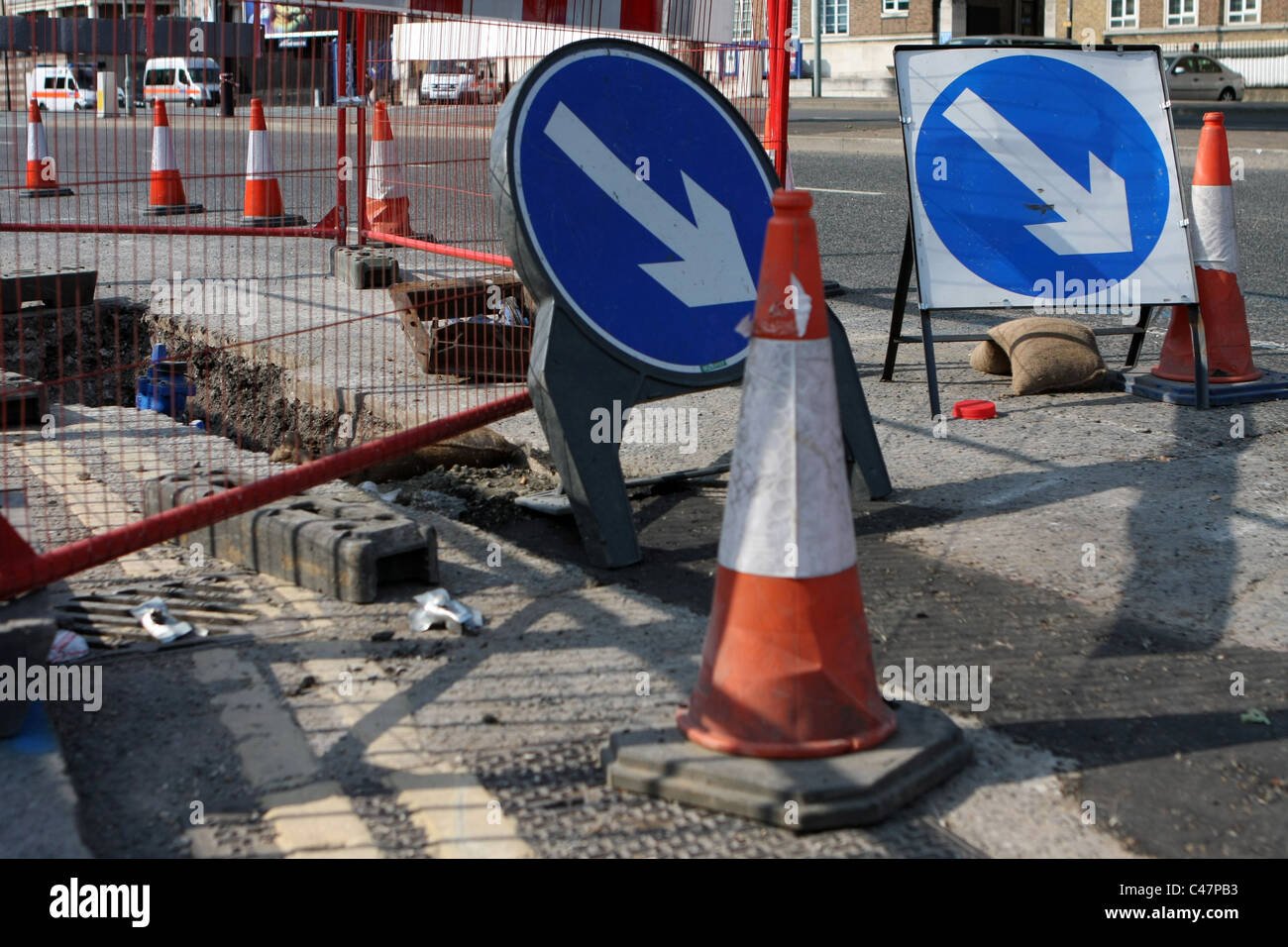 keep right signs and a cone in front of roadworks in London Stock Photo ...
