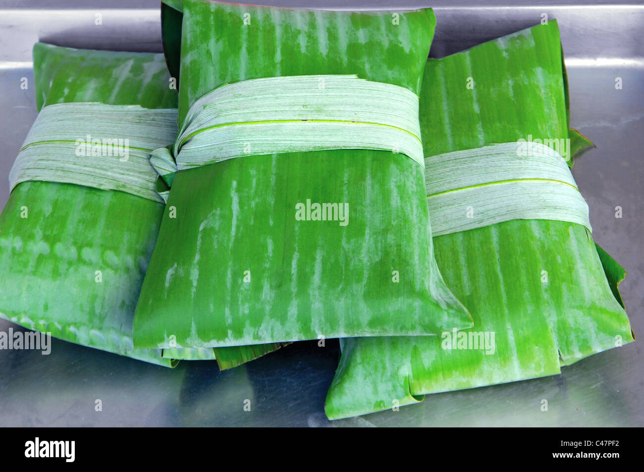 Rice dumplings wrapped in banana leaves, Taiwan Stock Photo - Alamy