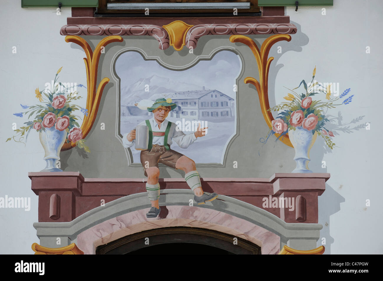 house facade and window decorated with traditional painting in Bavaria ...