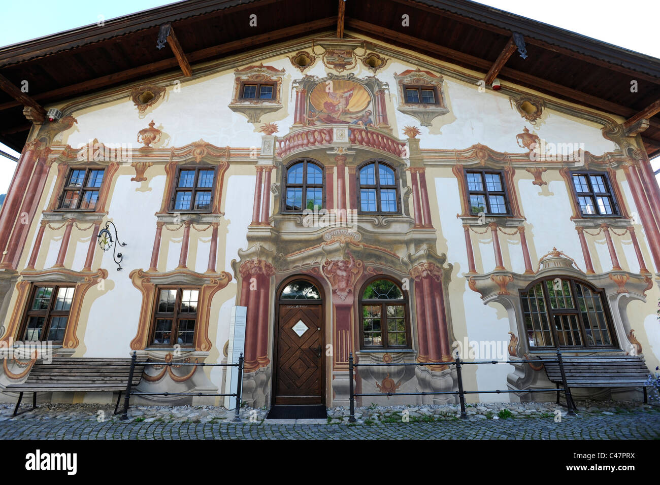 house facade and window decorated with traditional painting in Bavaria ...