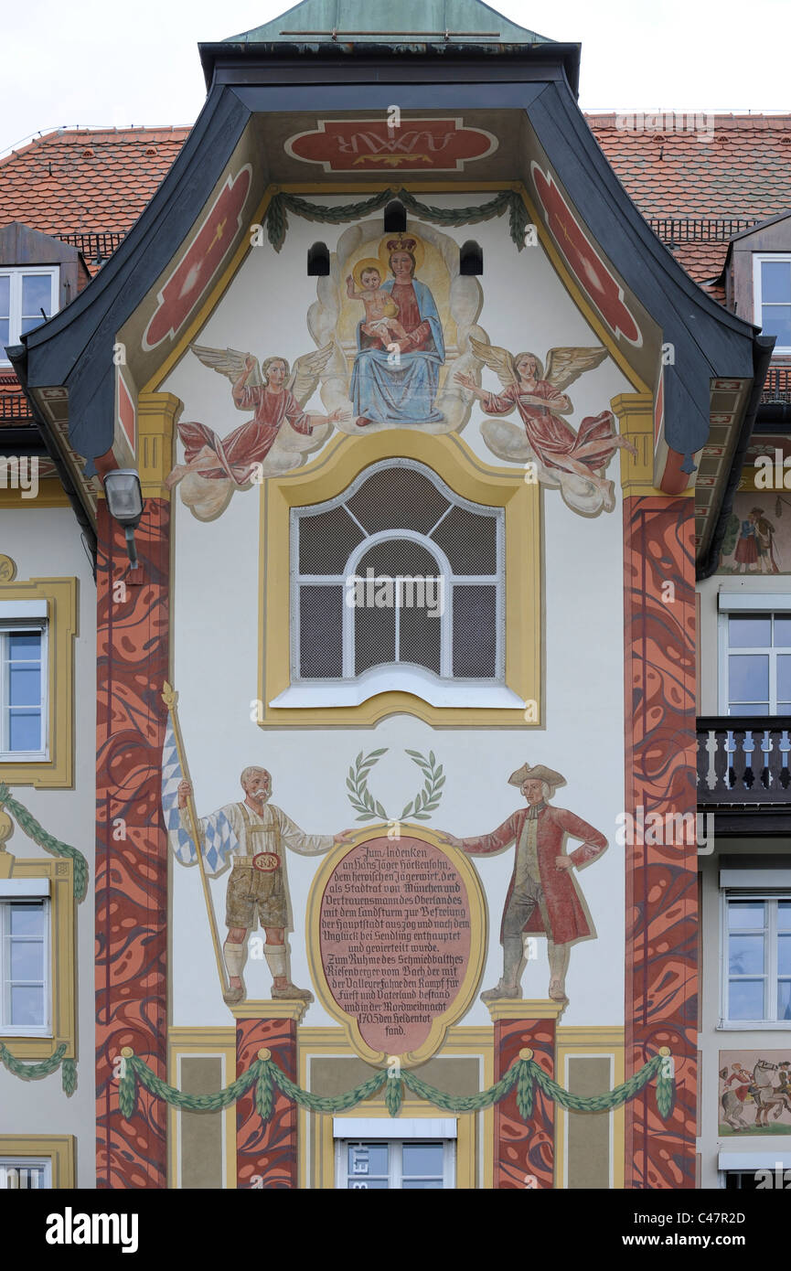 house facade and window decorated with traditional painting in Bavaria ...