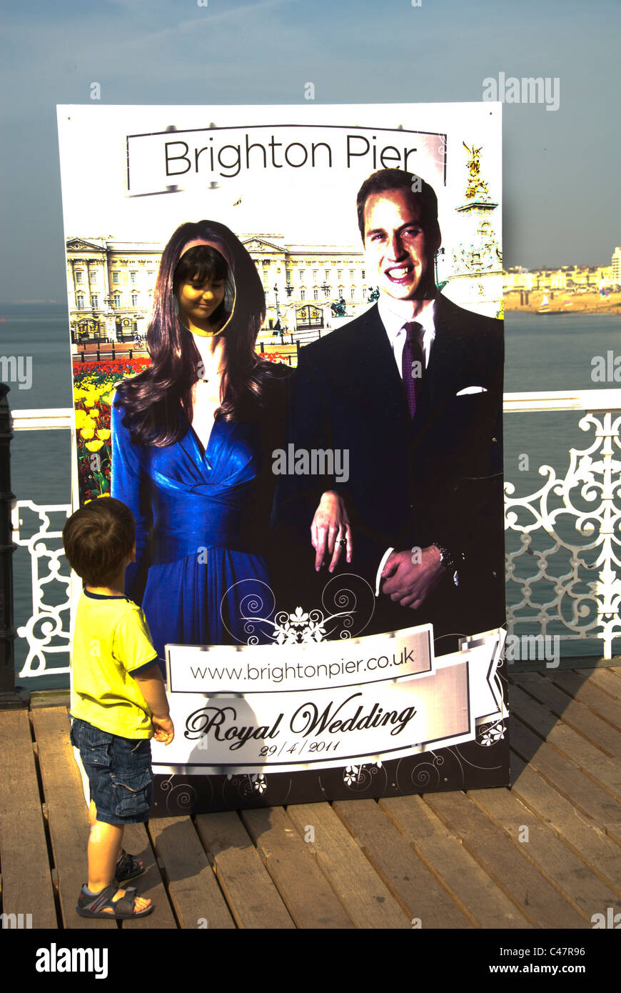 EAST SUSSEX; BRIGHTON; ROYAL WEDDING FUN PLACARD ON THE PIER; "That's ...