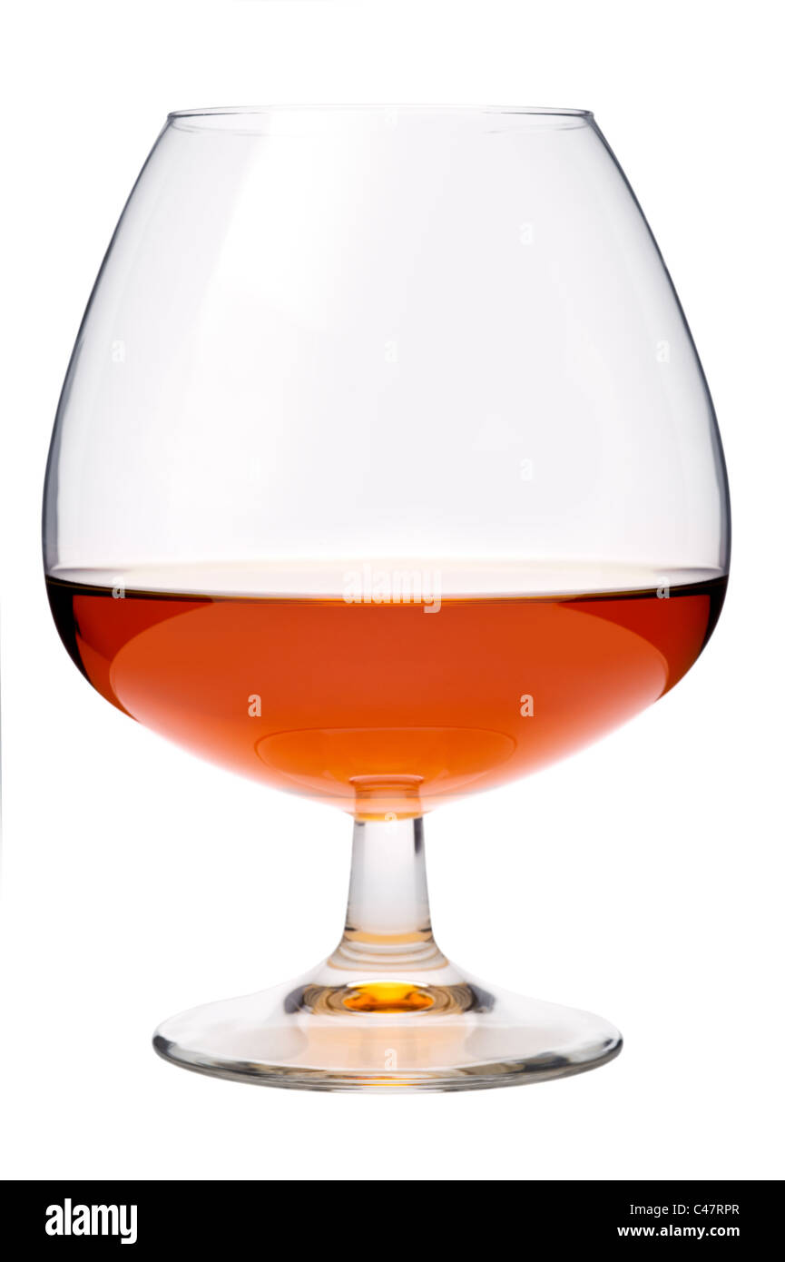 Cognac in a glass, isolated, white background Stock Photo - Alamy