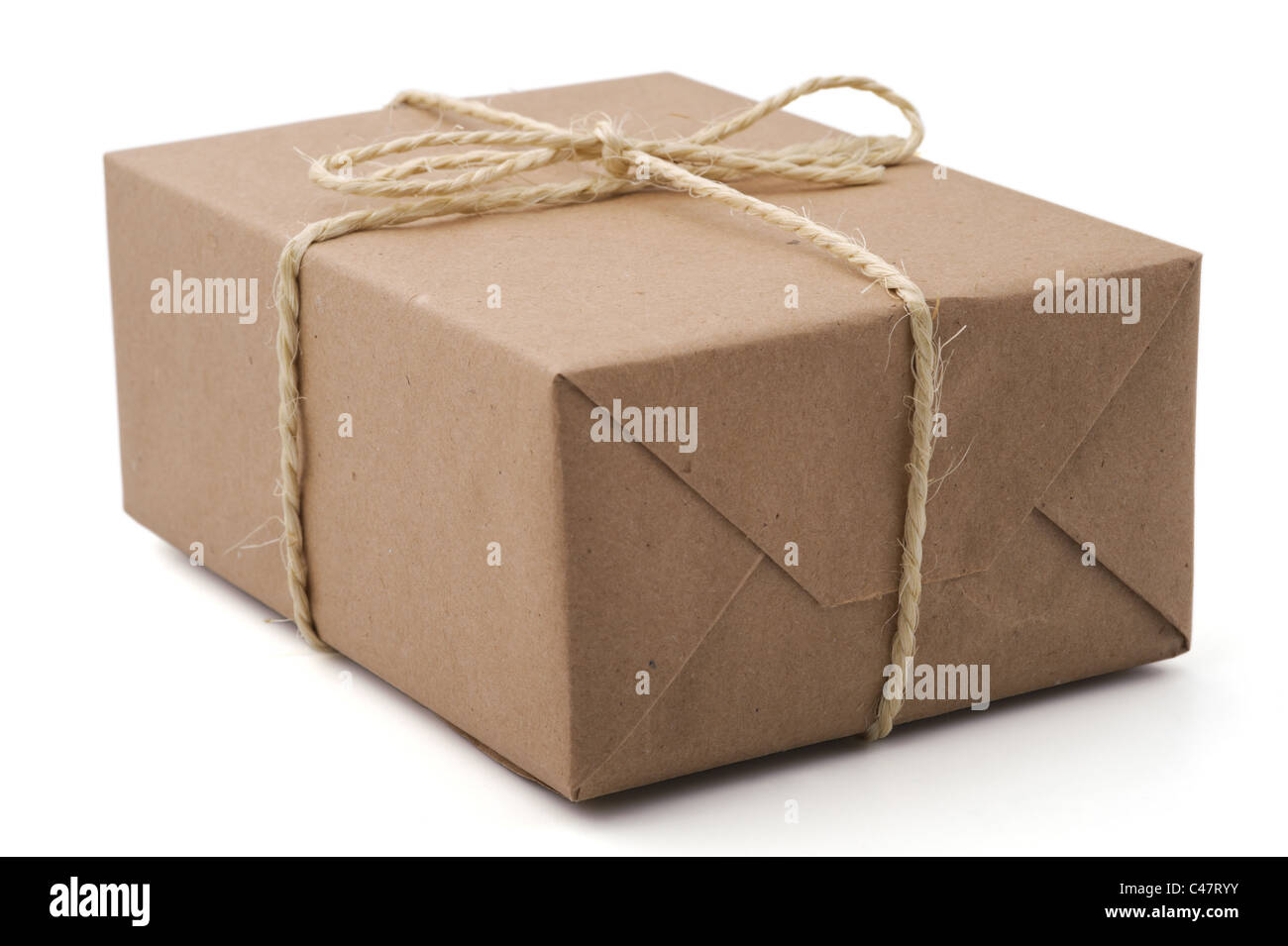 Brown parcel, isolated, white background Stock Photo - Alamy
