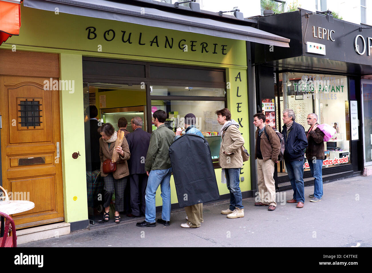 Queue at Boulangerie shop, Montmartre, Paris France Stock Photo - Alamy