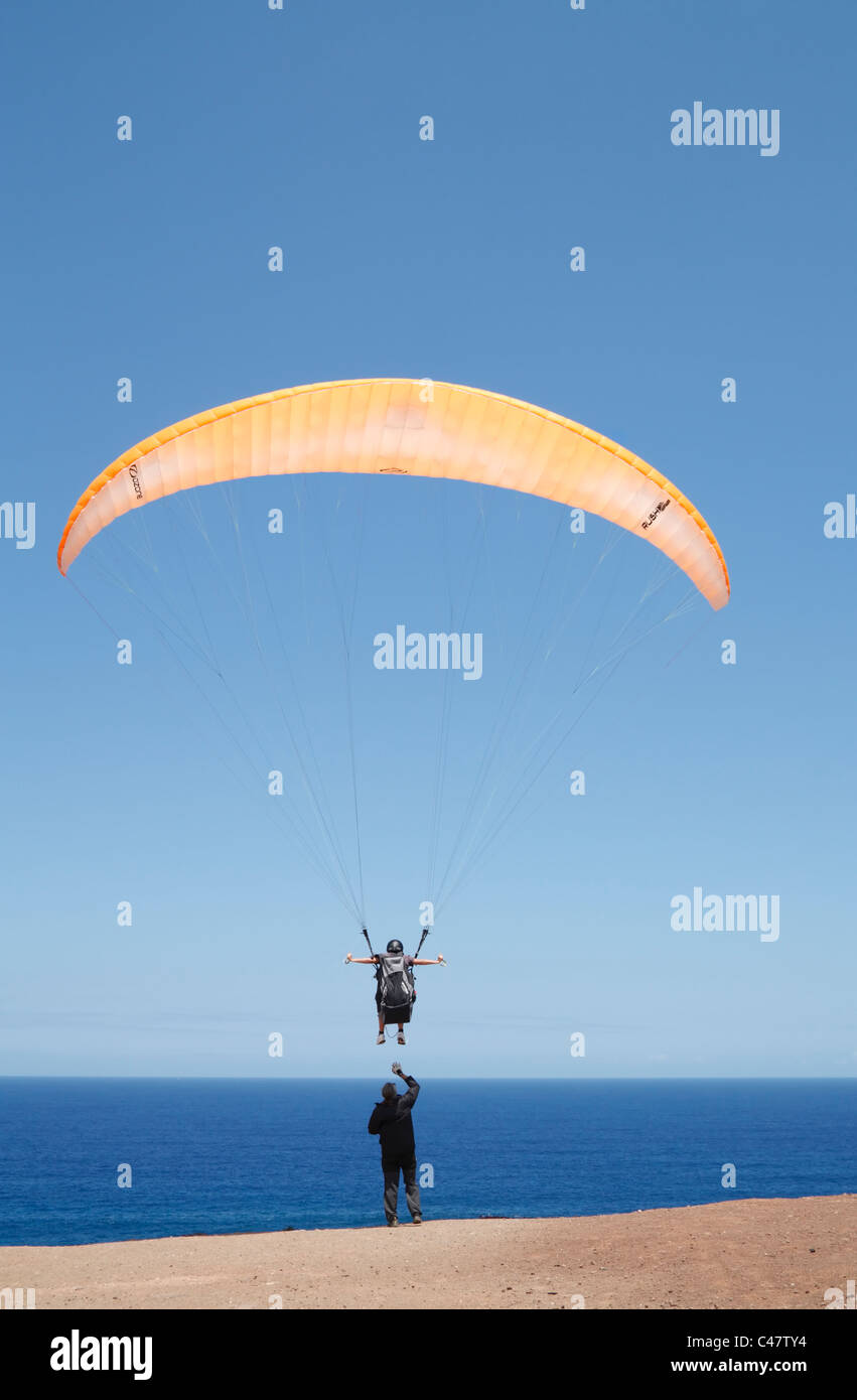 Paraglider taking off Stock Photo - Alamy