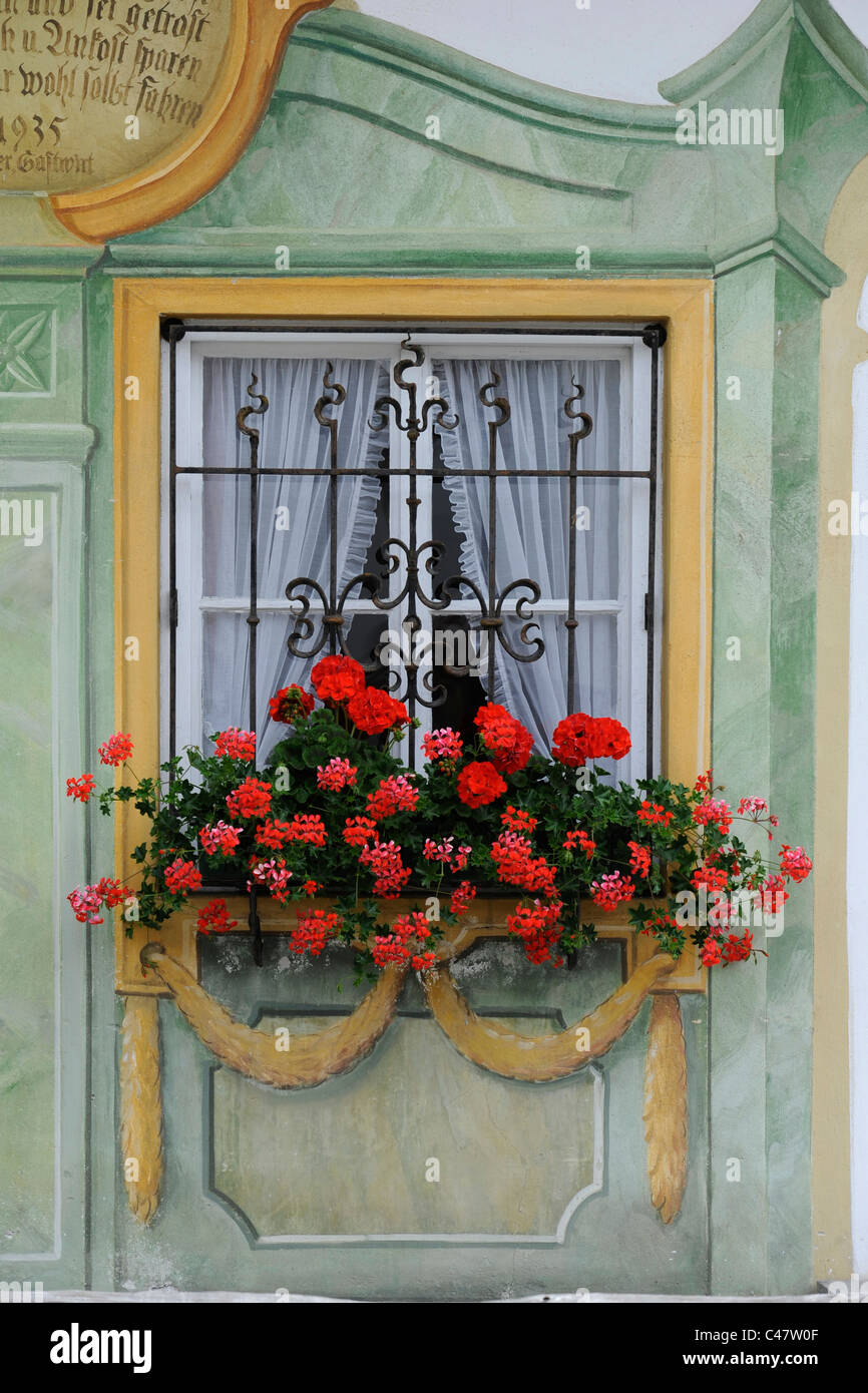 house facade and window decorated with painting in Bavaria, Germany ...
