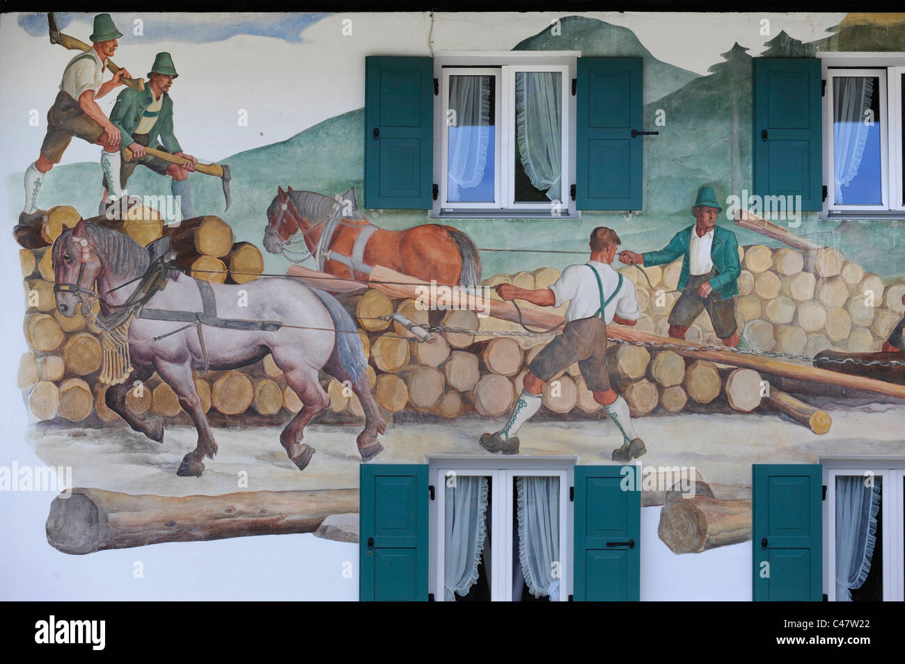 house facade and window decorated with painting in Bavaria, Germany ...