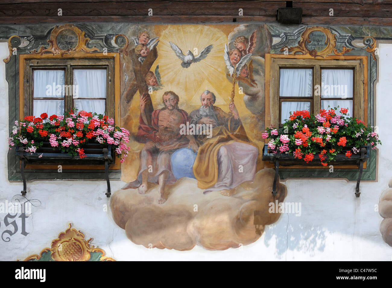 house facade and window decorated with painting in Bavaria, Germany ...