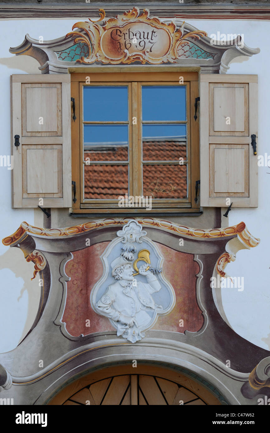 house facade and window decorated with painting in Bavaria, Germany ...