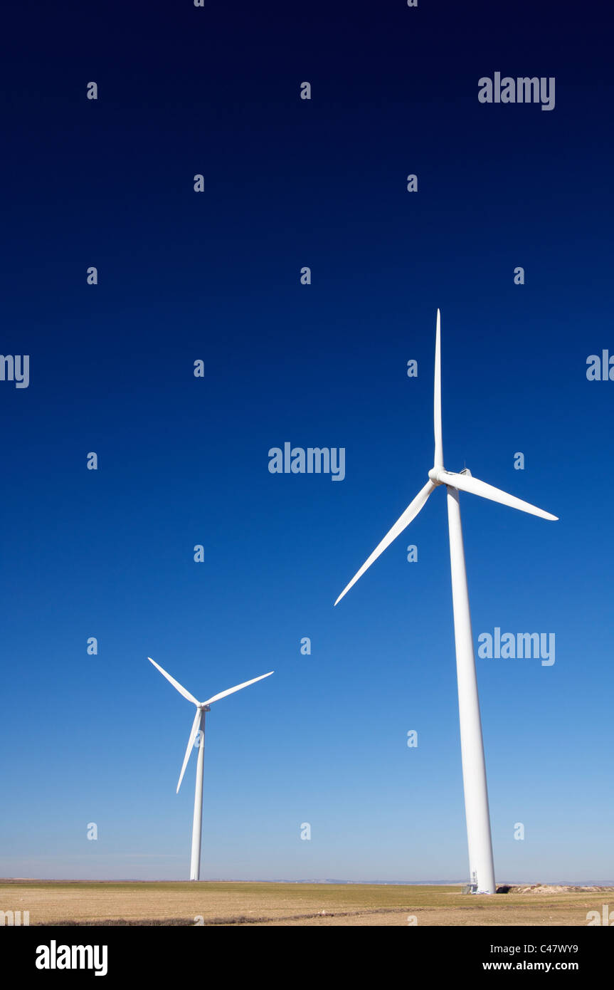 two modern windmills with clear blue sky Stock Photo - Alamy