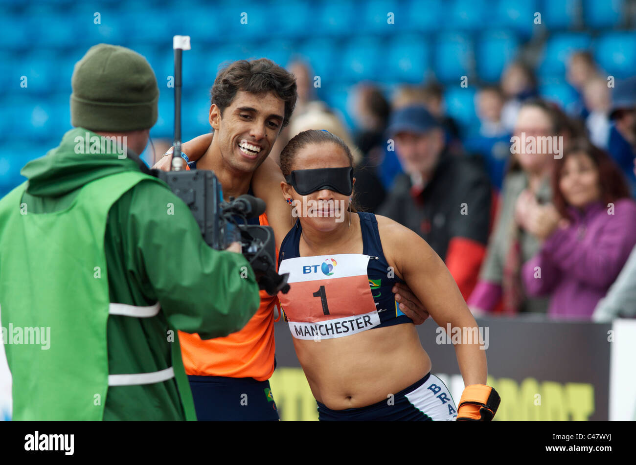 blind runner celebrates winningat paralympic world cup, manchester, may ...
