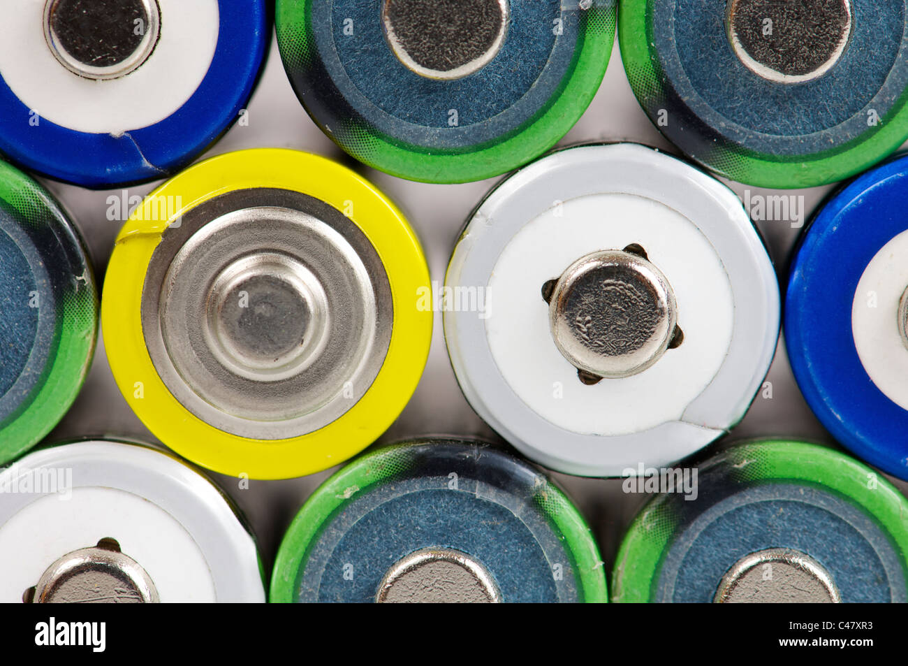 forefront of a group of batteries colors Stock Photo - Alamy