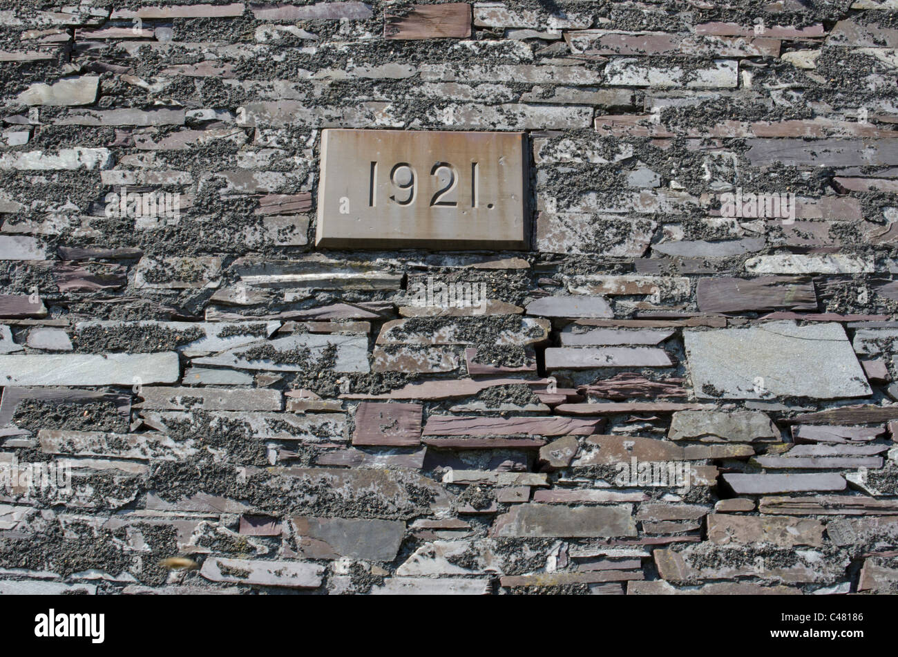 Date plaque on the wall of a ruined building in Dinorwig slate mine ...