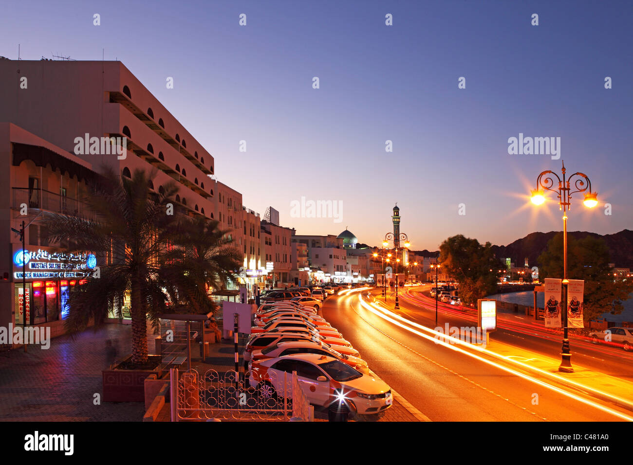 Dusk on the Corniche, the area along the harbour front in Muttrah ...