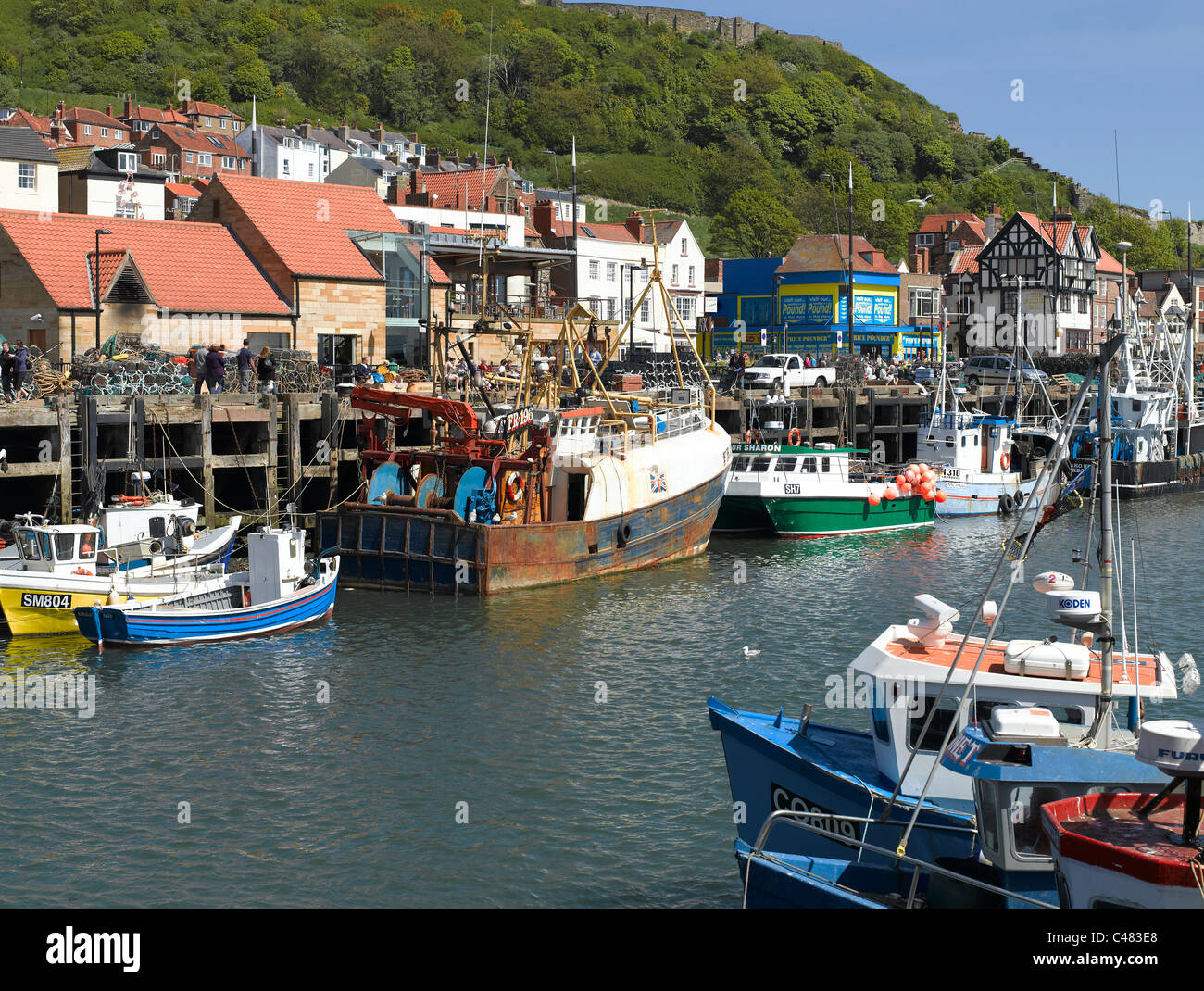 Fishing boats boat moored at the quayside Scarborough Harbour North ...