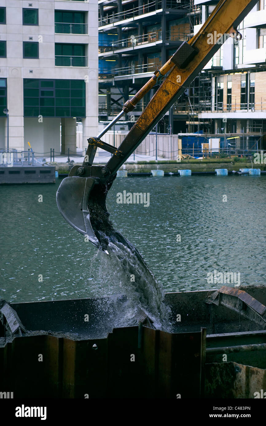 Excavator bucket during dredging excavations Stock Photo - Alamy