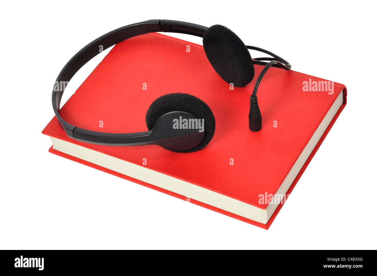 Headphones and book isolated on white background Stock Photo - Alamy