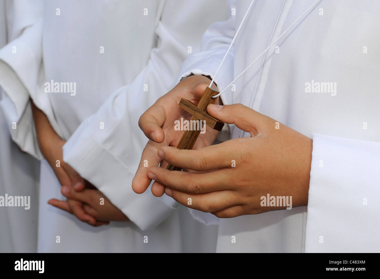 Catholic religion, altar boys Stock Photo - Alamy