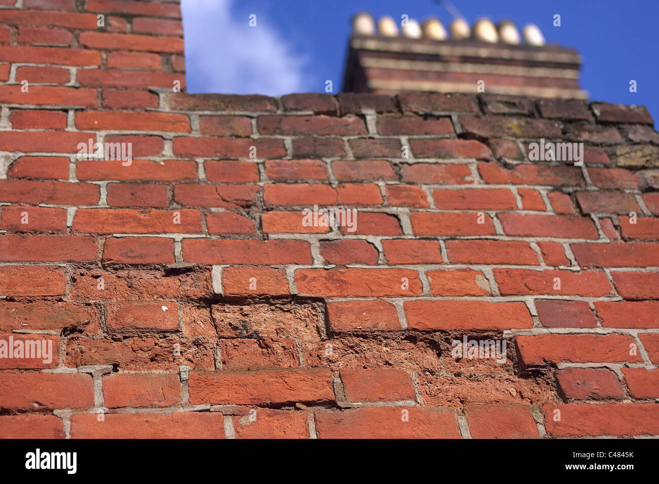 Serious decay of mortar joints and crumbling brick faces caused by ...