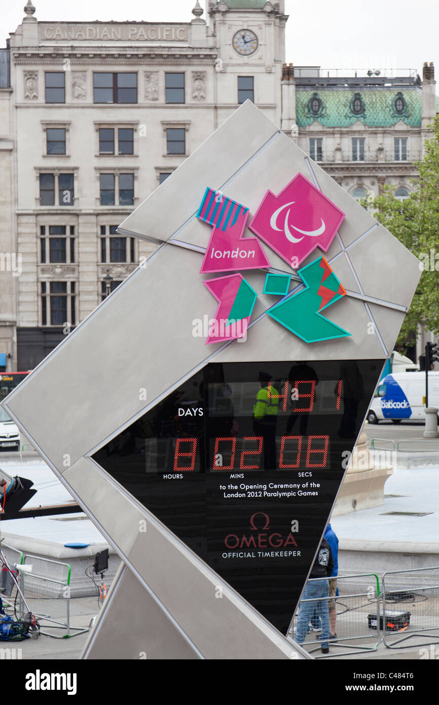Clock and edifice in Trafalgar Square, displaying the logo and ...