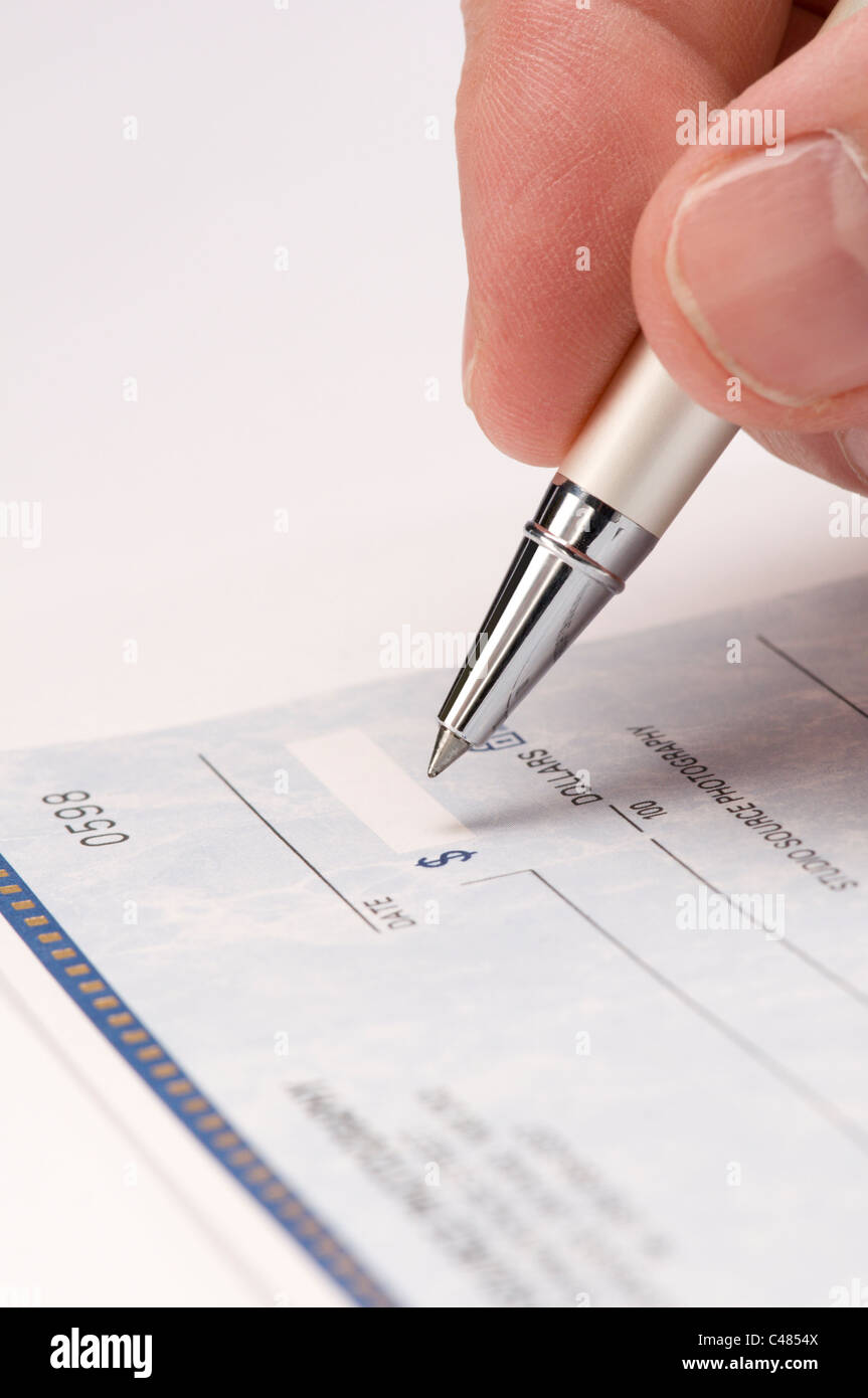 Paying in cheque hi-res stock photography and images - Alamy