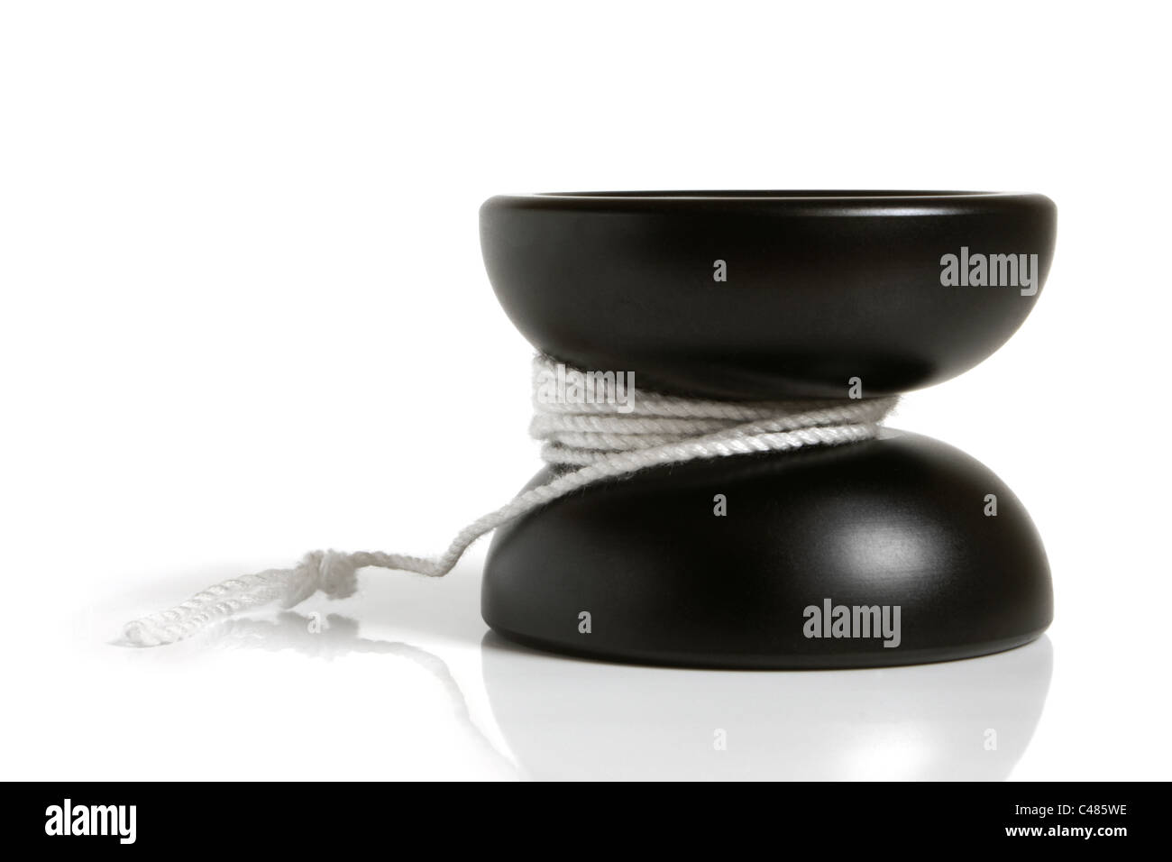 Black yo-yo toy Stock Photo - Alamy