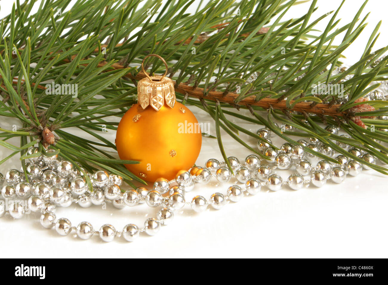 Christmas ball and green spruce branch Stock Photo - Alamy