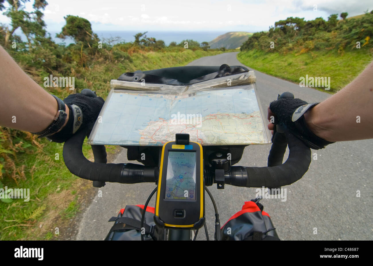 A GPS and map on a bicycle tour along the coast of Exmoor near hunters ...