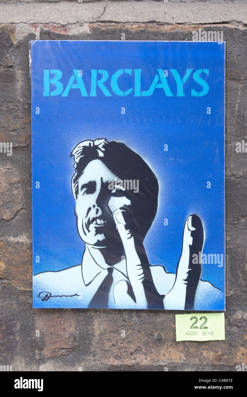 Supporters of a bank tax hold an anti-greed art giveaway of 300 signed ...